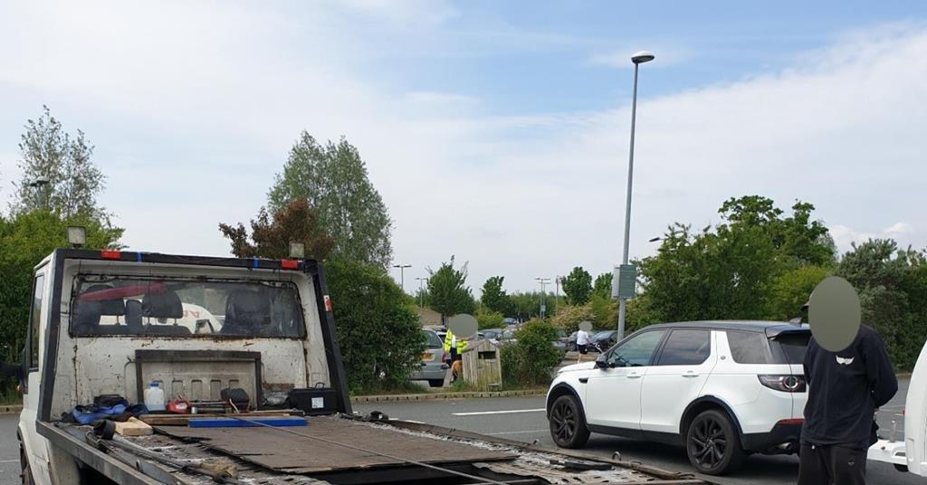 A lorry driver who rolled a cigarette with no hands on the wheel and a ...