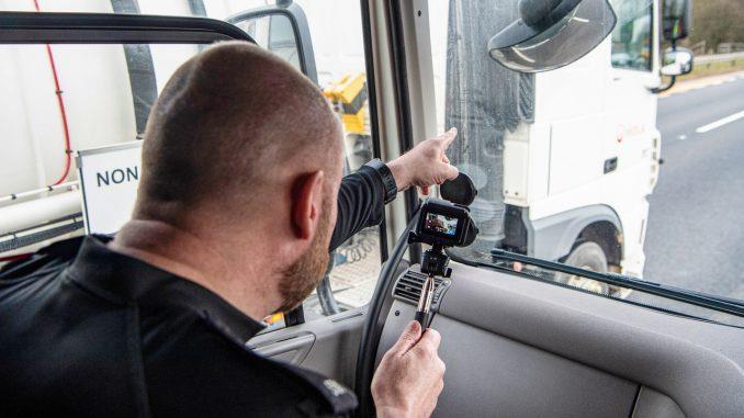 Lorry driver with laptop on dashboard among list of offenders caught in ...