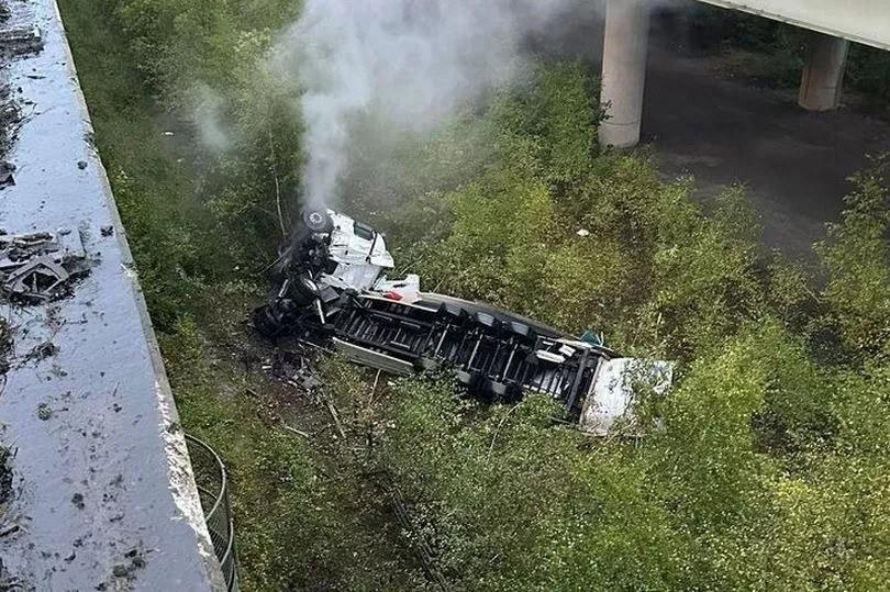 HGV driver avoids serious injury after lorry plunges 60 feet off ...
