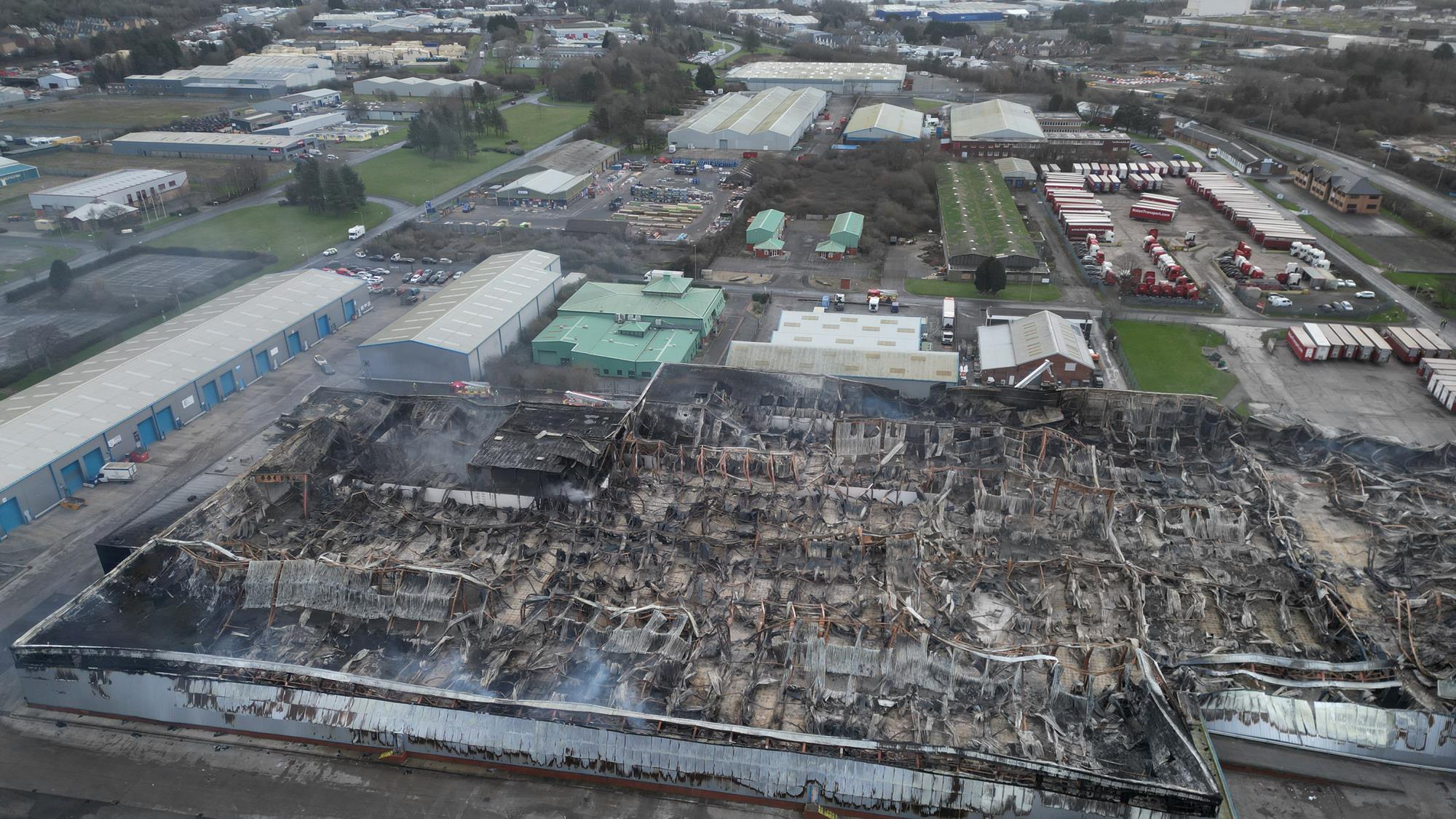 Man arrested after fire destroys haulage firm Owens Group's Bridgend ...